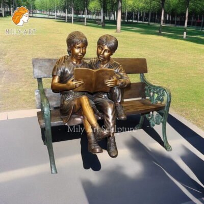 Bronze Boy And Girl Sclupture Reading Books on Bench